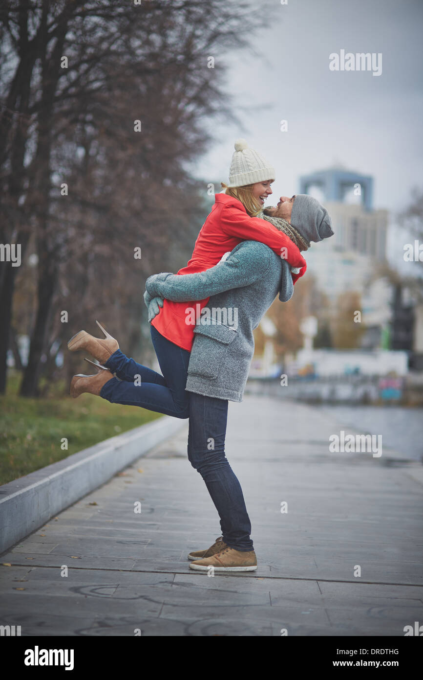 Portrait happy guy holding girlfriend hi-res stock photography and ...