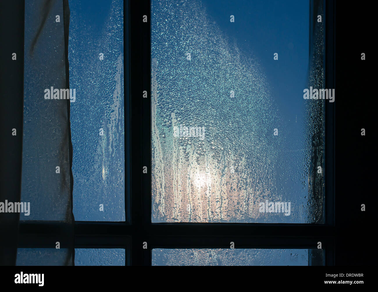 Moonlight through the window. Sweaty glass Stock Photo - Alamy