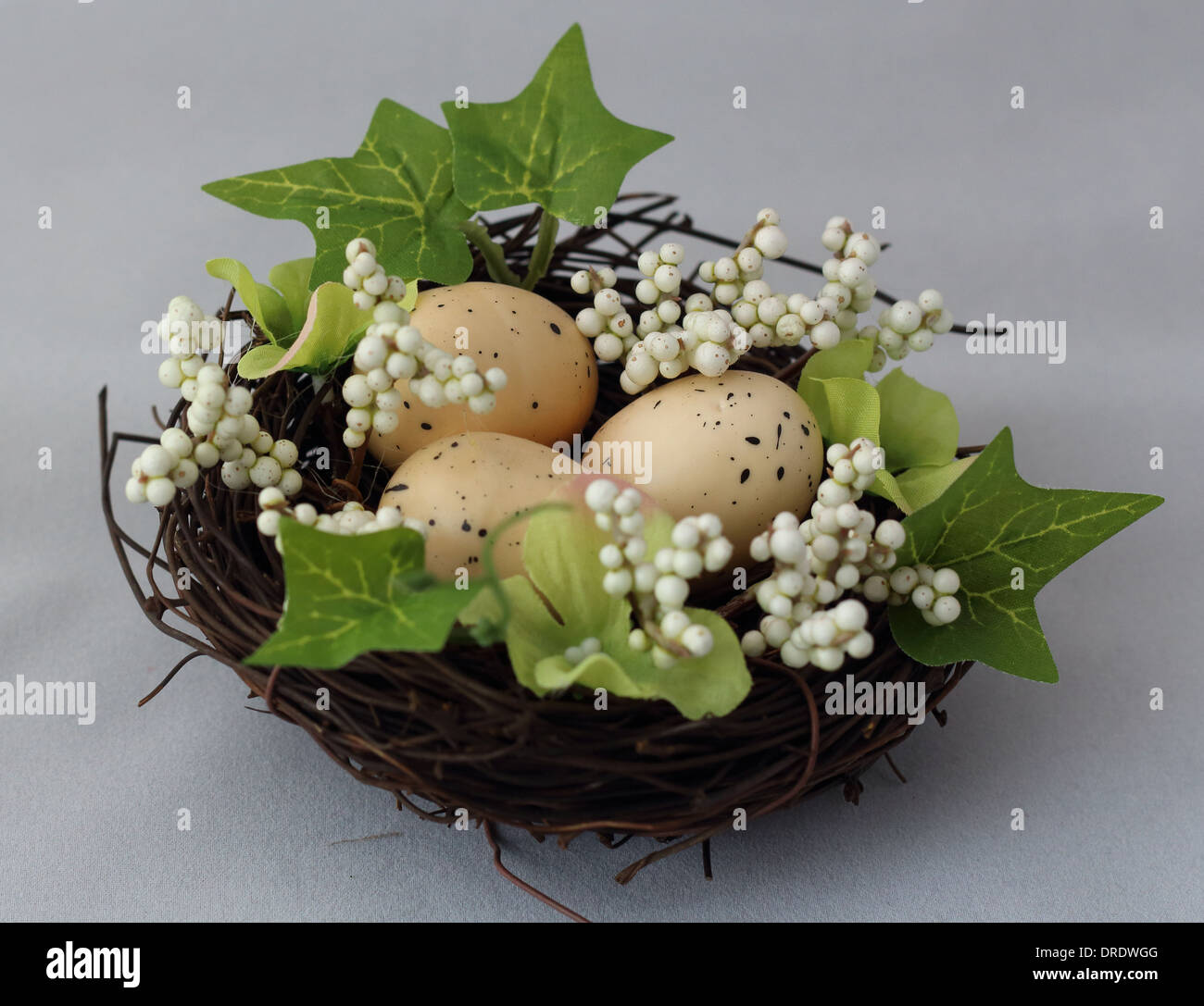 Straw Nest with eggs inside Stock Photo - Alamy