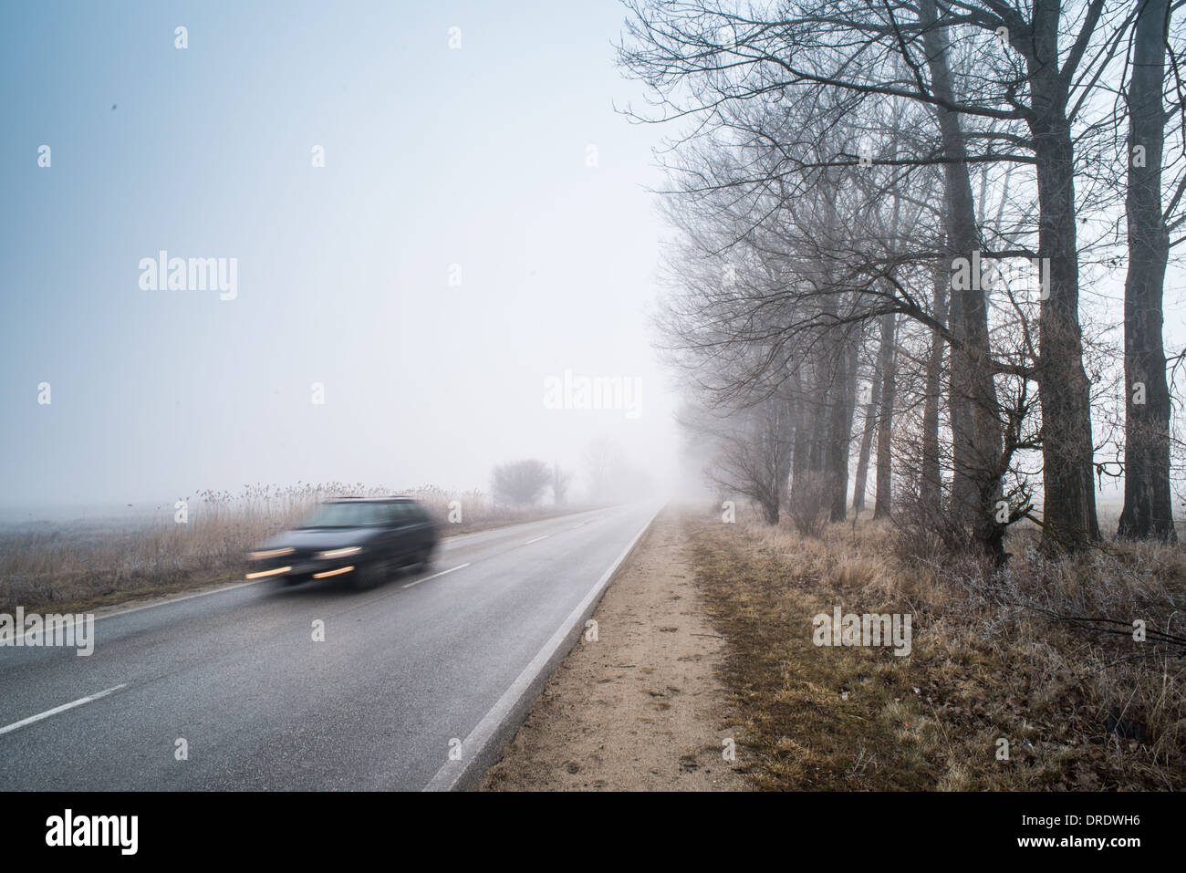 Driving in winter foggy hi-res stock photography and images - Alamy