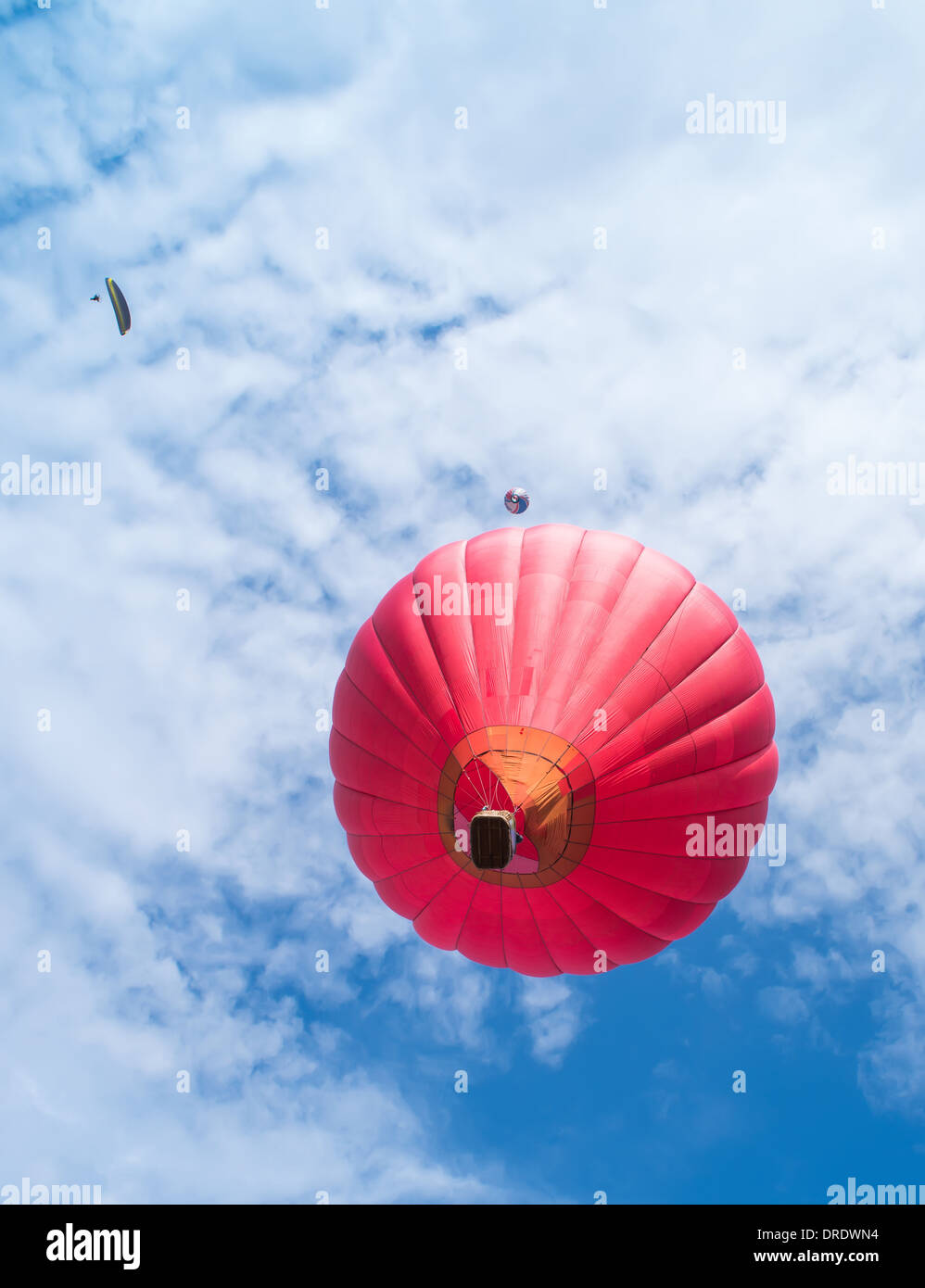 Red balloon in the blue cloudy sky Stock Photo - Alamy