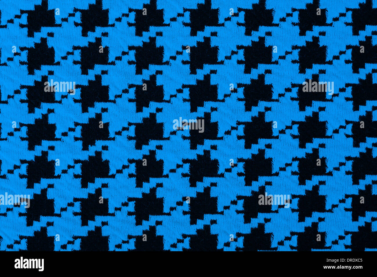 Blue material in geometric patterns, a textile background Stock Photo ...