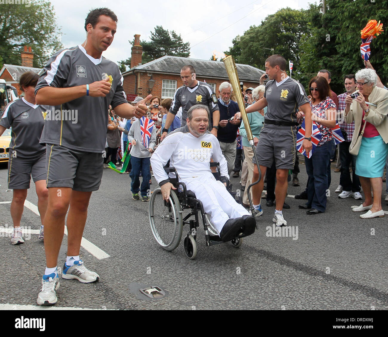Simon Hawkins Torchbearer 089 carries the Olympic Torch through ...