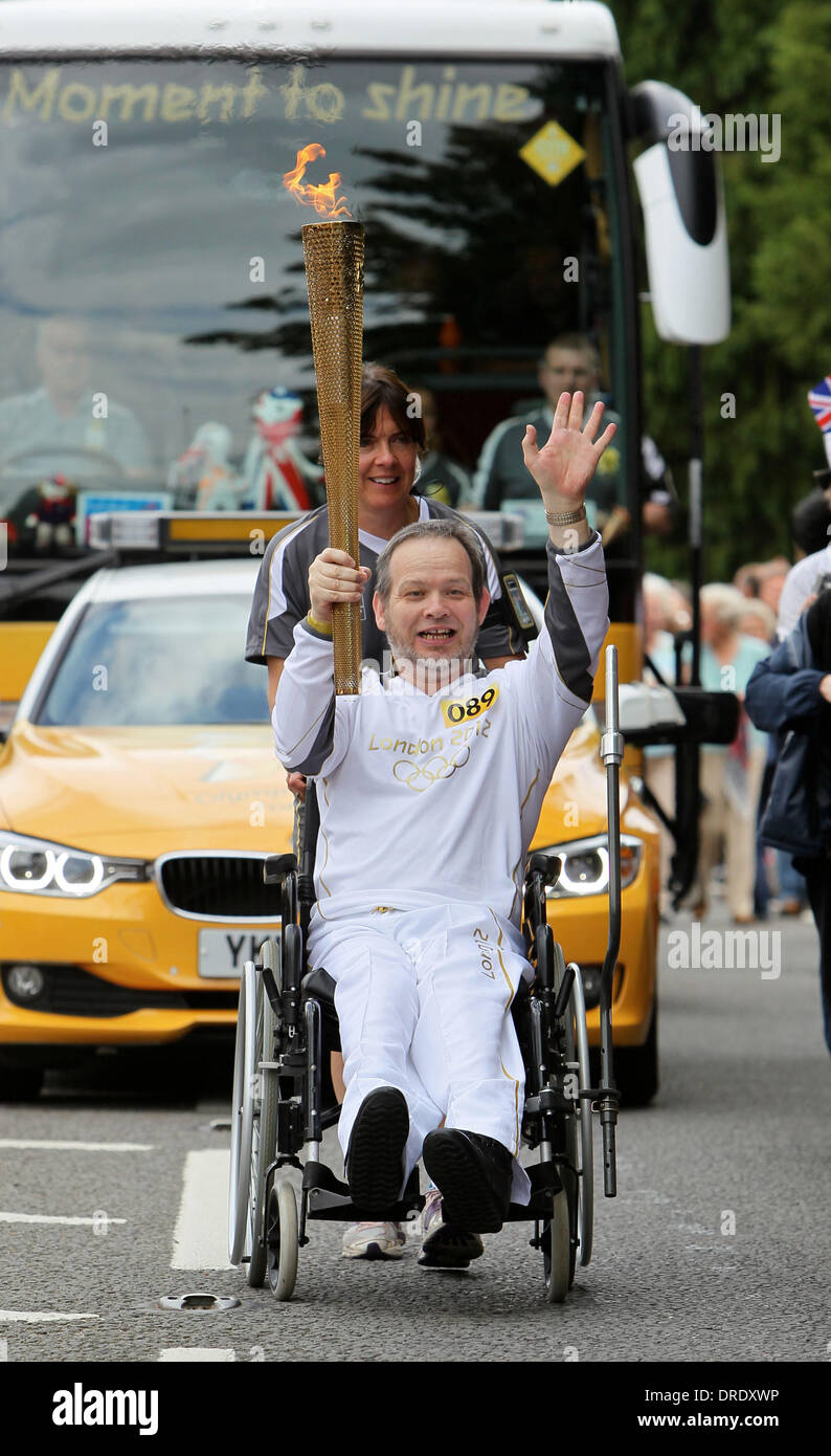 Simon Hawkins Torchbearer 089 carries the Olympic Torch through ...