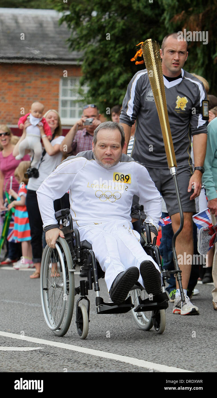 Simon Hawkins Torchbearer 089 carries the Olympic Torch through ...