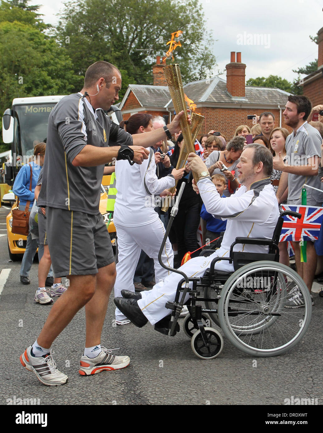 Simon Hawkins Torchbearer 089 carries the Olympic Torch through ...