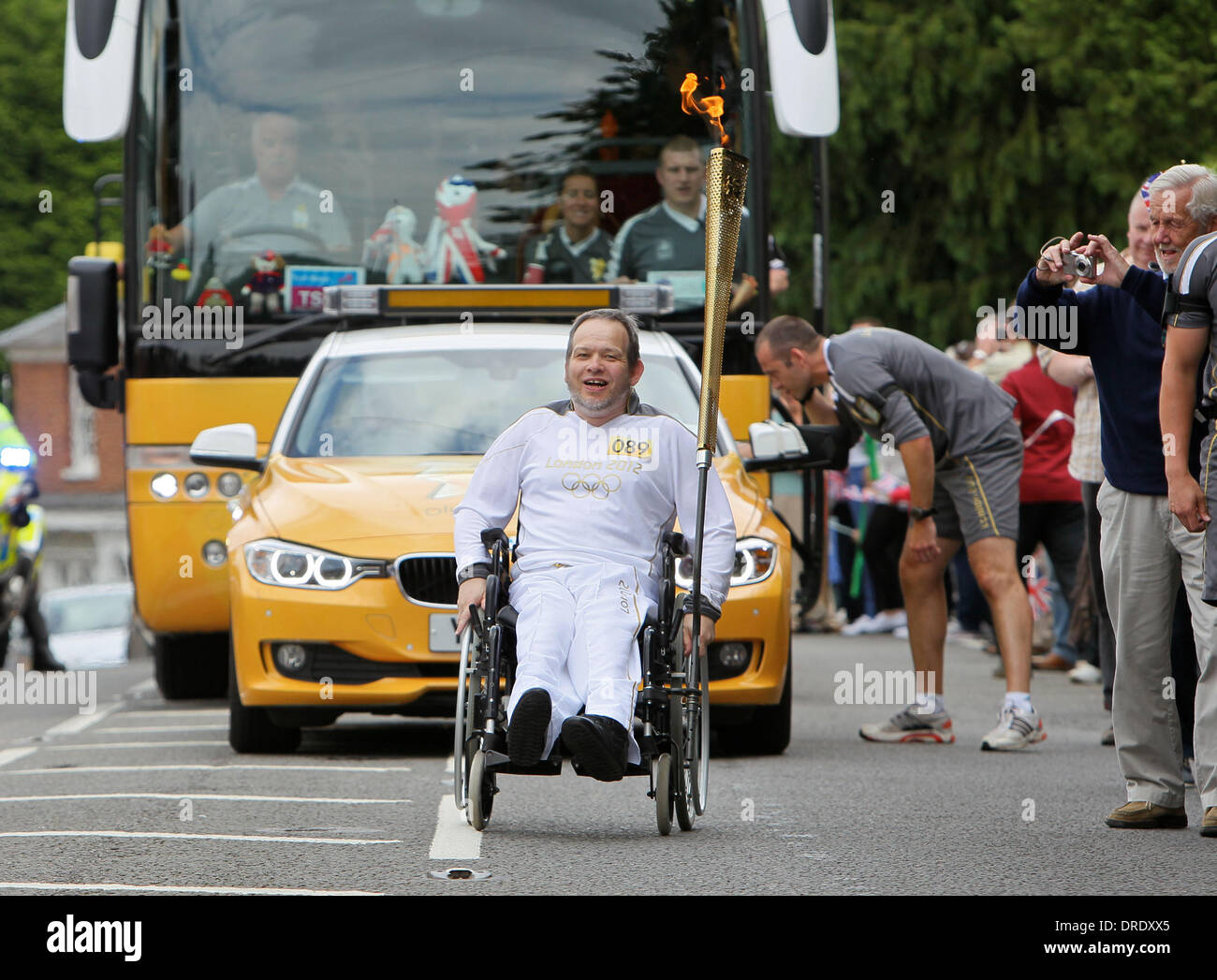 Simon Hawkins Torchbearer 089 carries the Olympic Torch through ...