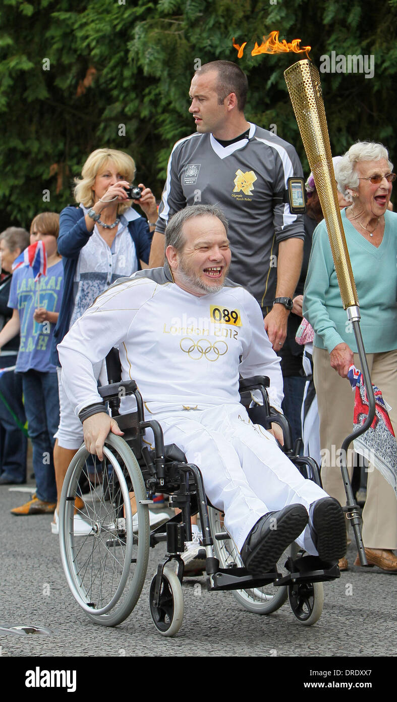 Simon Hawkins Torchbearer 089 carries the Olympic Torch through ...