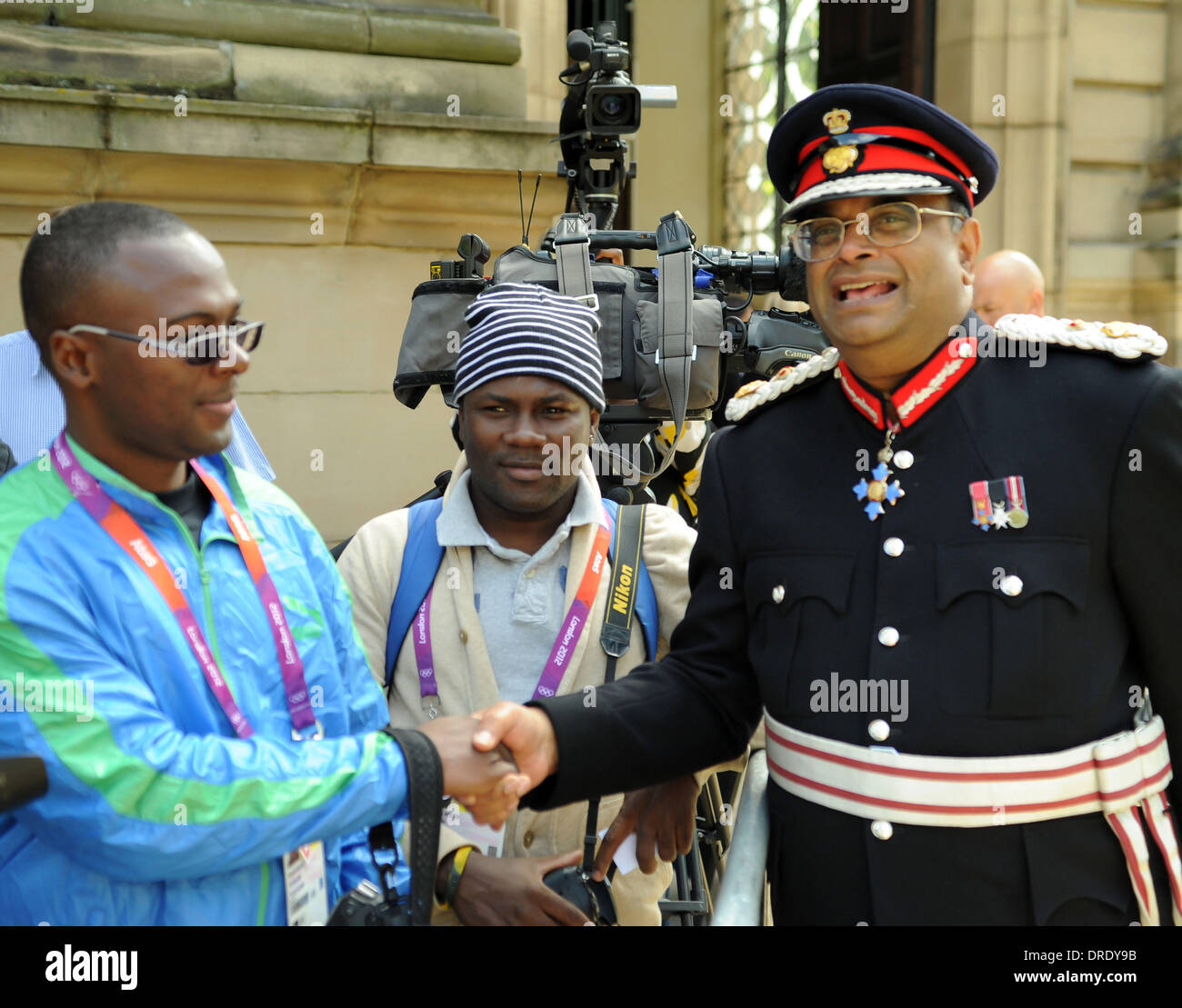 Mr Paul Sabapathy CBE Members and coaches of the Olympic USA and ...