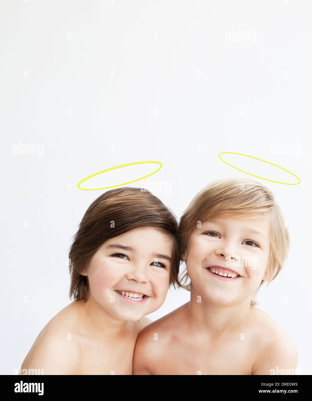 Portrait of brothers with halos Stock Photo - Alamy