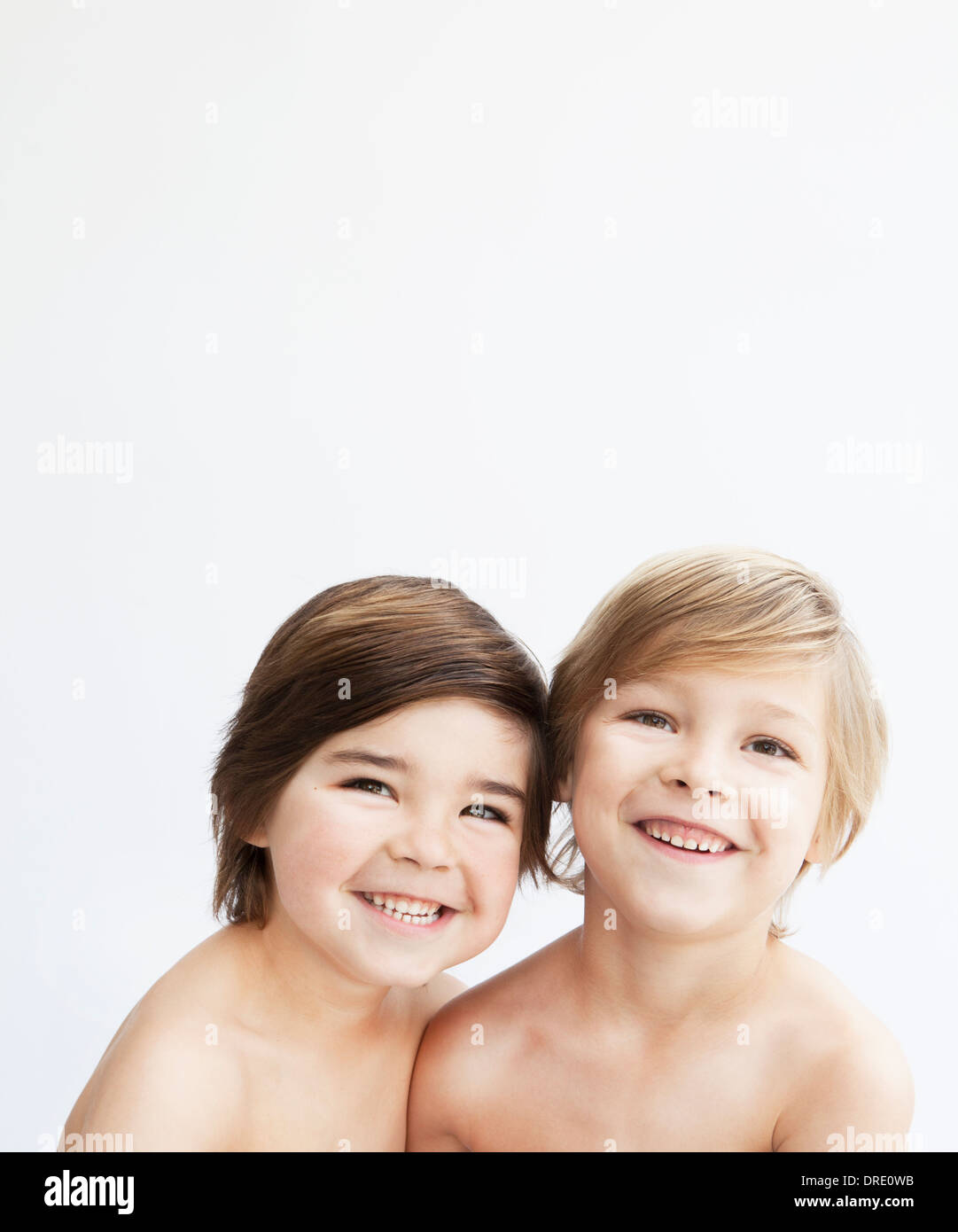 Portrait of brothers on white background Stock Photo - Alamy