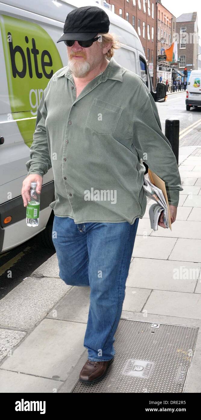Brendan Gleeson sports a beard, baseball cap and sunglasses whilst ...