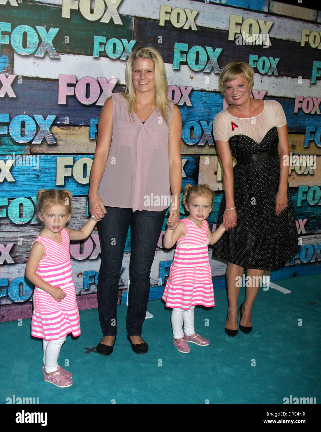Martha Plimpton with Cregut Twins and their mother Fox All-Star party ...
