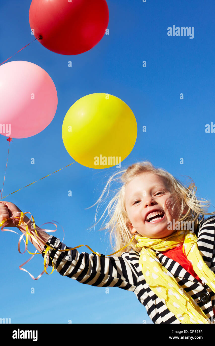 happy girl with colorful balloons Stock Photo - Alamy