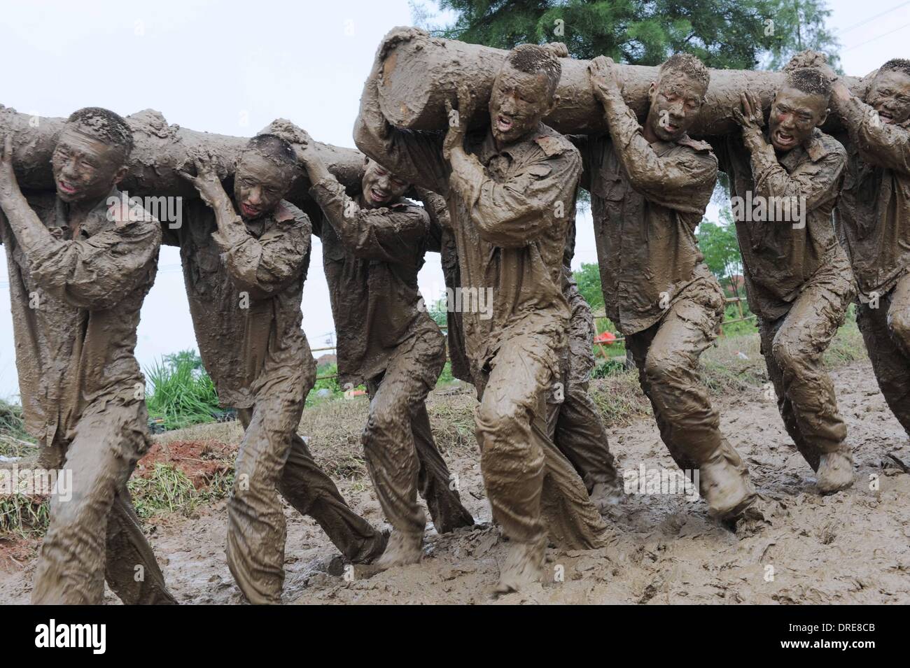 MUDDY COPS These are no bog-standard training methods. Rookie police ...
