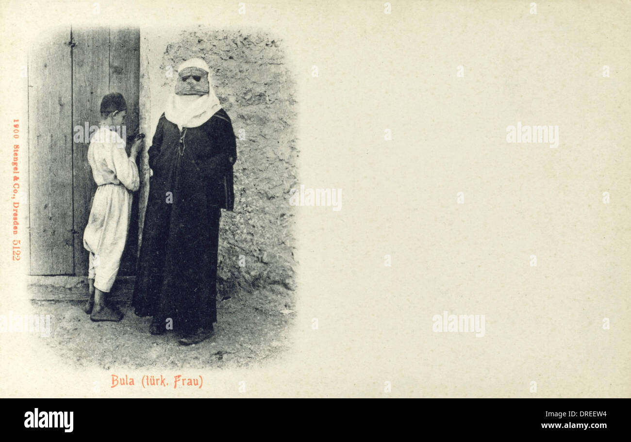 Veiled Turkish Woman and boy - Balkans Stock Photo - Alamy