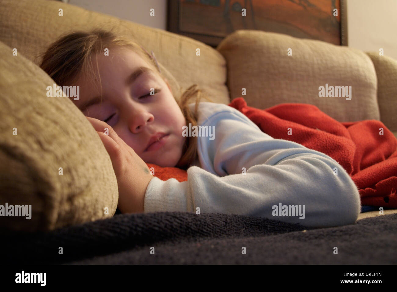 five years old girl rest in a sofa at a suburban house Stock Photo - Alamy
