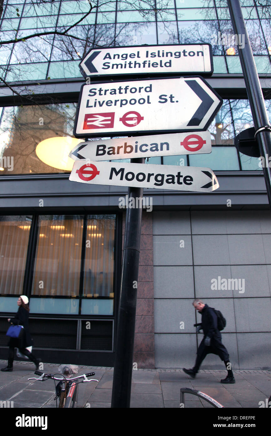 Street signs pointing to places and stations in the City of London ...