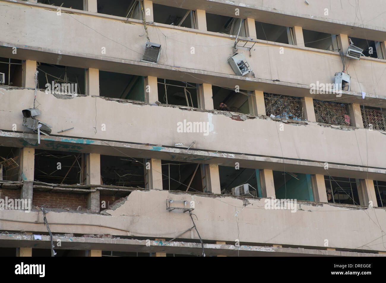 Cairo, Egypt. 24th Jan, 2014. The damaged facade of a police ...