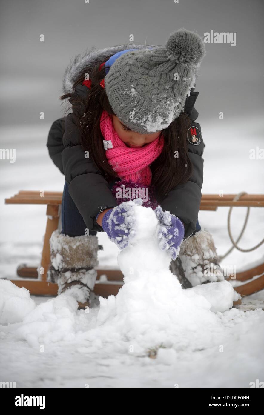 the Hohe Meissner, Germany. 24th Jan, 2014. Baby Kyla builds a tiny ...