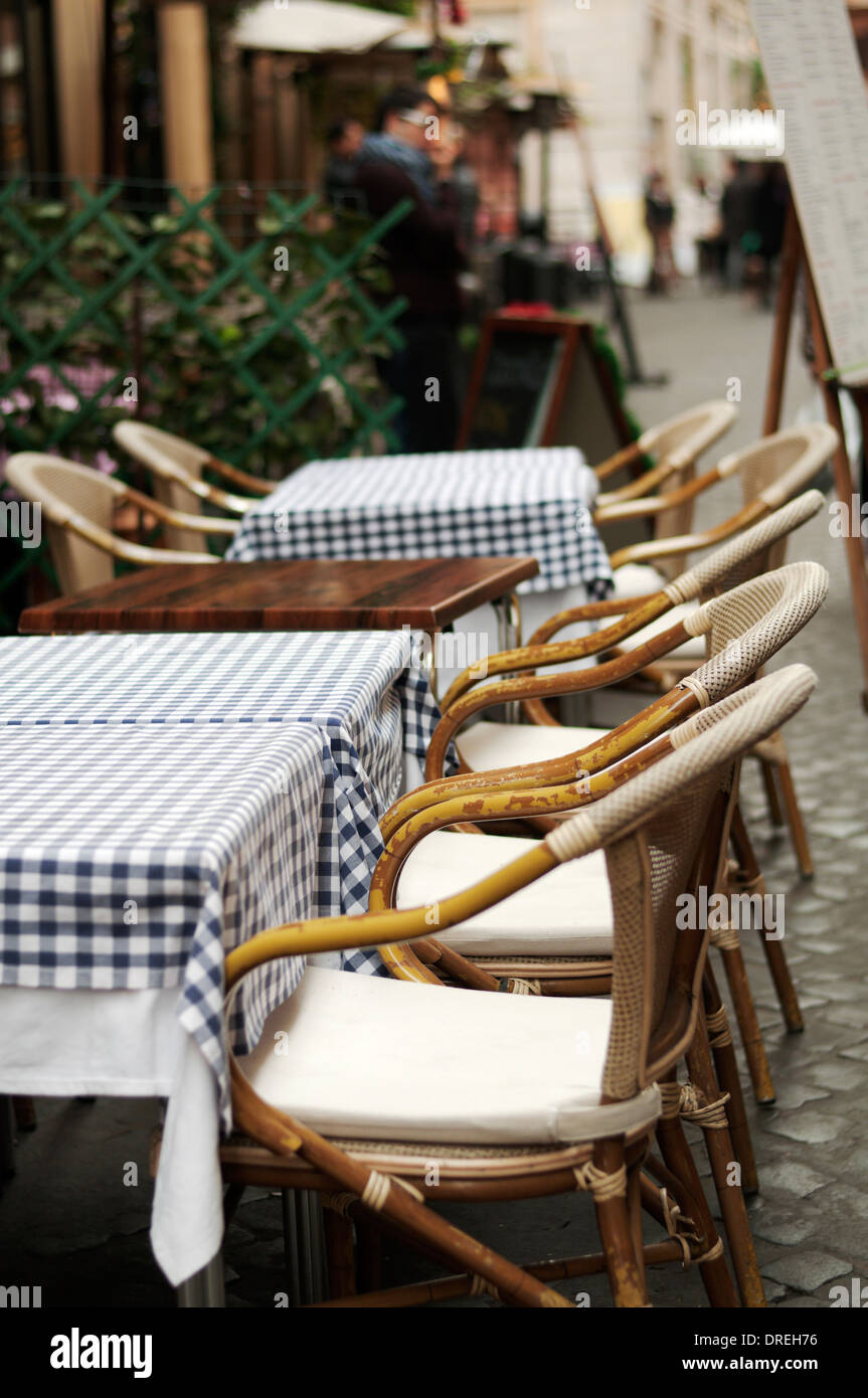 Restaurant tables outdoors in Rome Stock Photo - Alamy