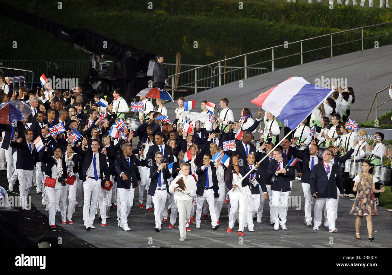 Laura Flessel-Colovic of the France Olympic fencing team carries her ...
