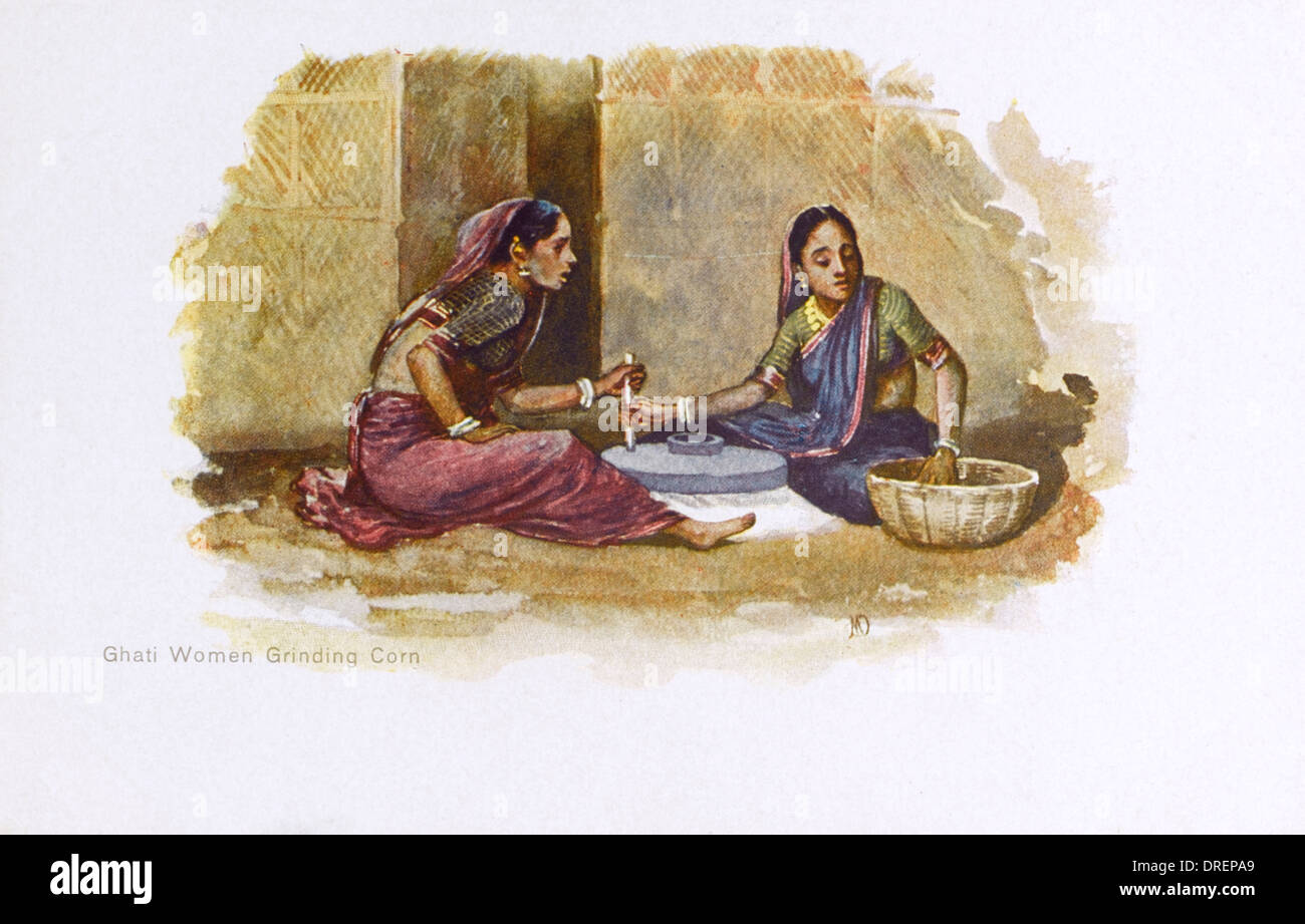 India - Ghati Women Grinding Corn Stock Photo - Alamy