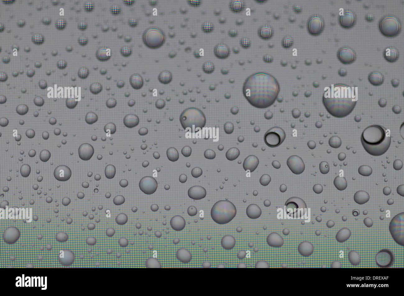 Droplets on screen Stock Photo - Alamy