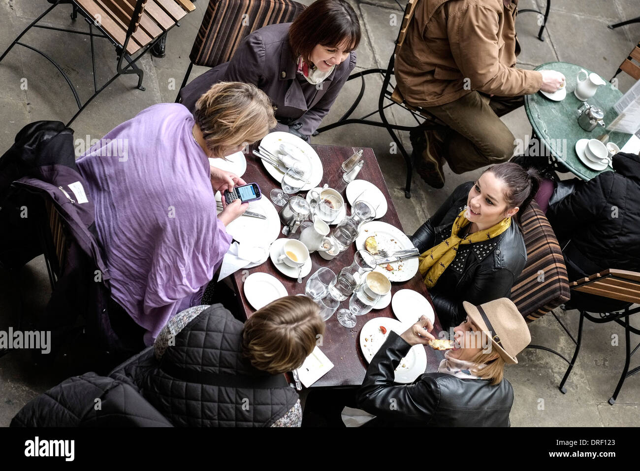Women enjoying lunch together Stock Photo - Alamy