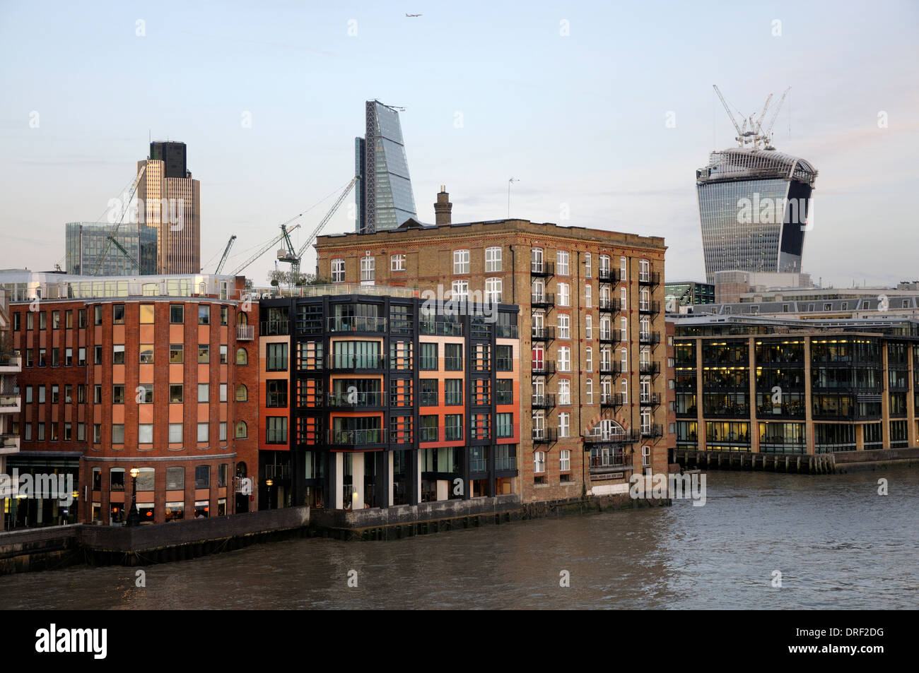 London, England, UK. Apartment buildings by the River Thames. Tower 42 ...