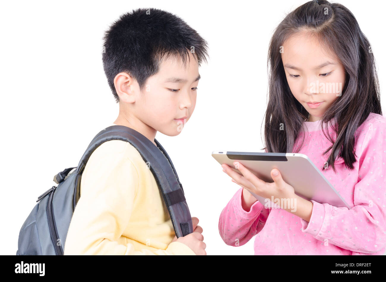 Smart children using touch pad computer and isolated on white ...