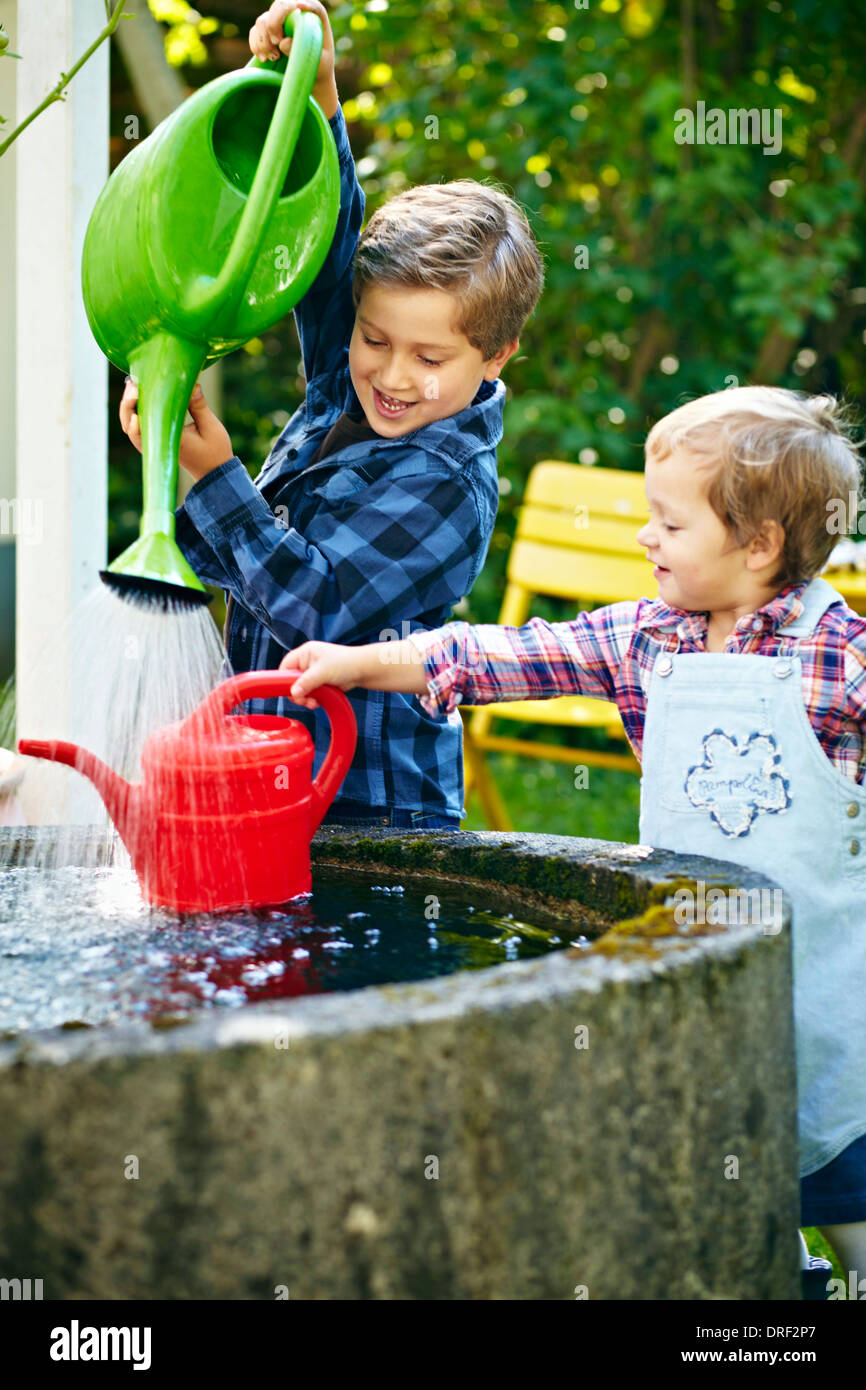 Two Children In Garden, Munich, Bavaria, Germany Stock Photo - Alamy