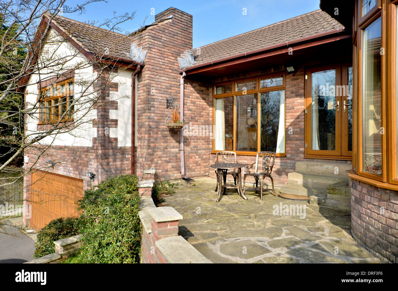 Patio area outside new build home Stock Photo - Alamy