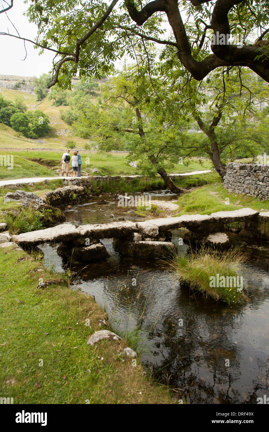 Packhorse bridge over river Aire Malham Cove Yorkshire UK Stock Photo ...
