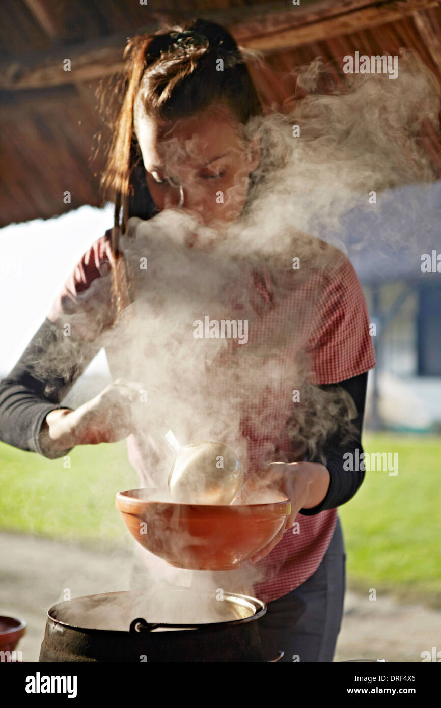 Pouring soup into pot hi-res stock photography and images - Alamy