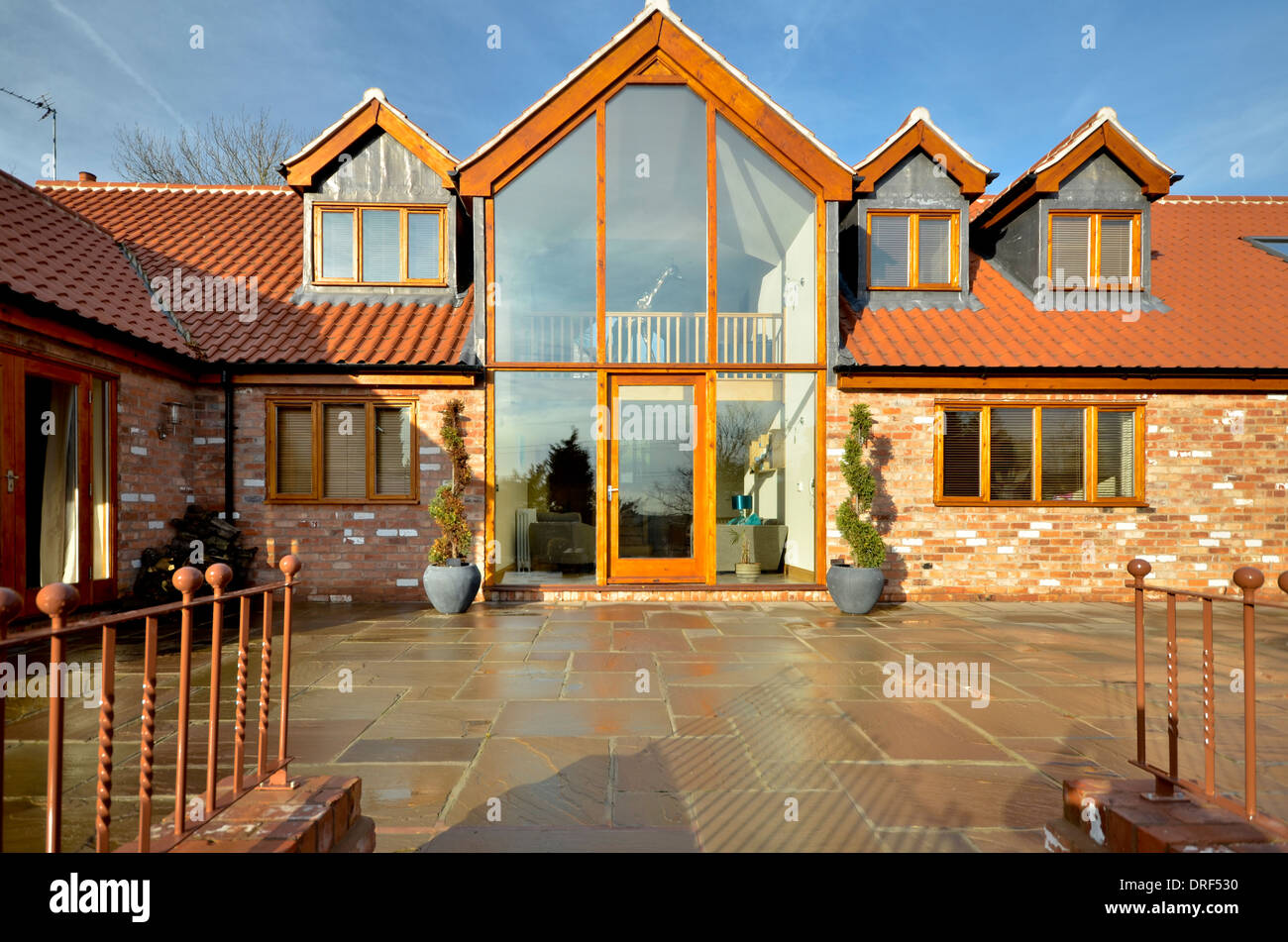 New Build house with double height glazed porch Stock Photo - Alamy