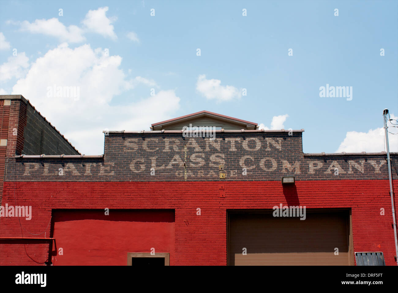 Red brick garage of the Scranton Plate Glass Company Stock Photo - Alamy
