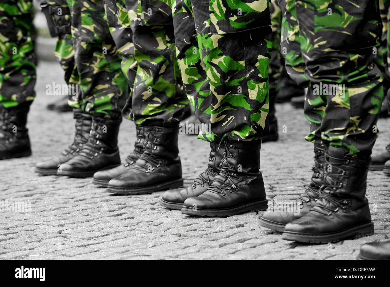 Soldiers in camouflage military uniform in rest position Stock Photo ...