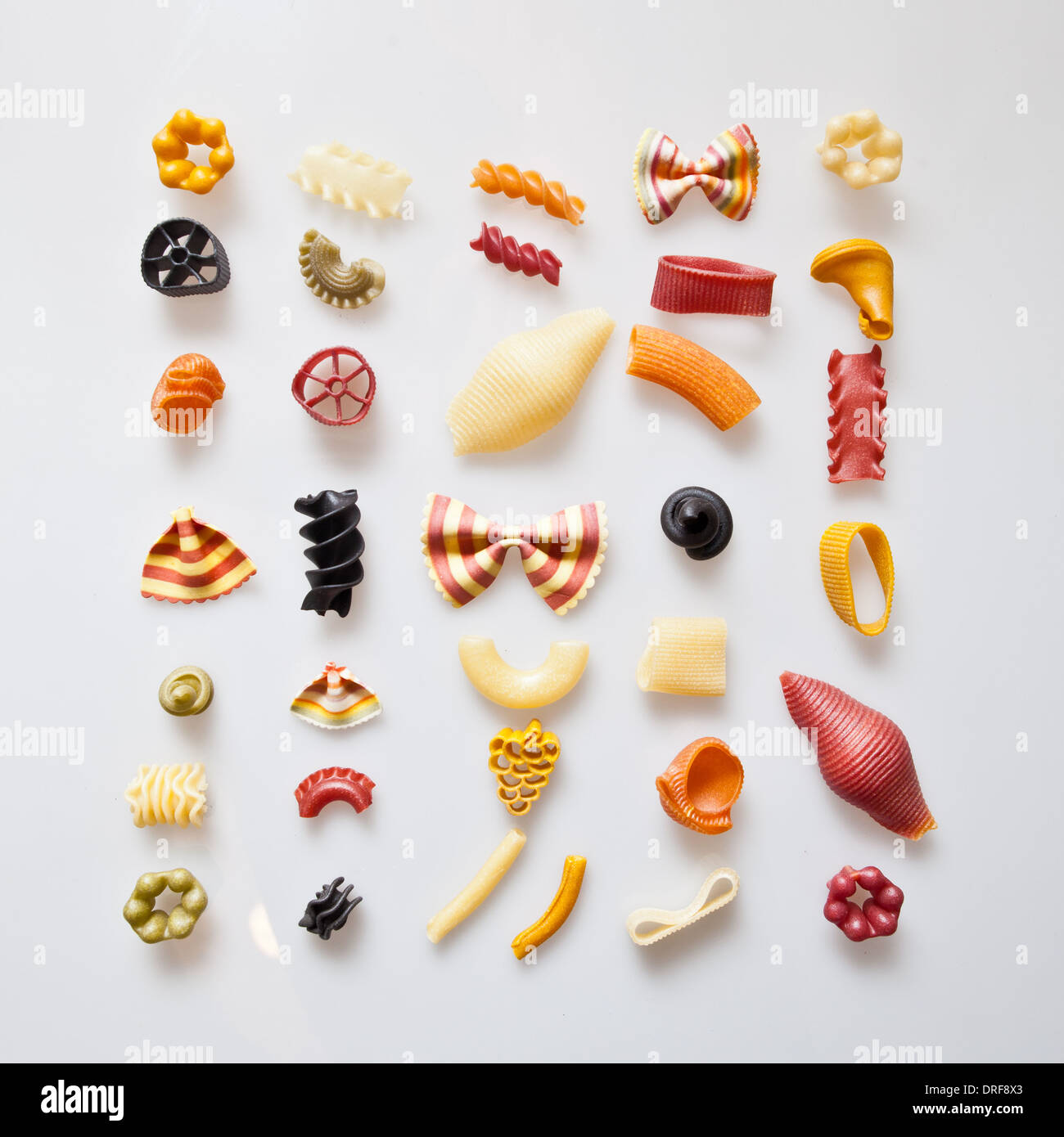 Colorful pasta mix isolated on white background Stock Photo - Alamy