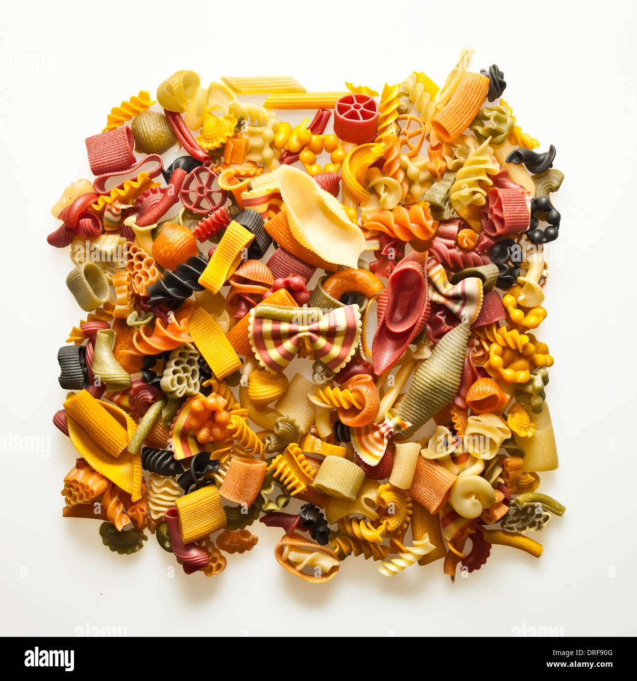 Colourful pasta mix isolated on white background Stock Photo - Alamy