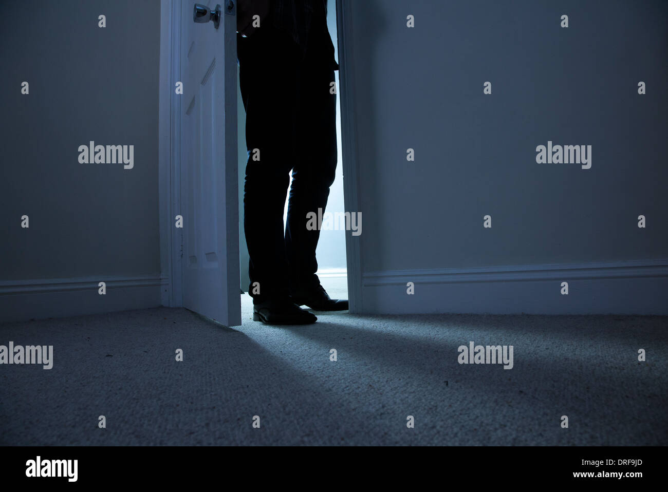 Man Standing In The Dark