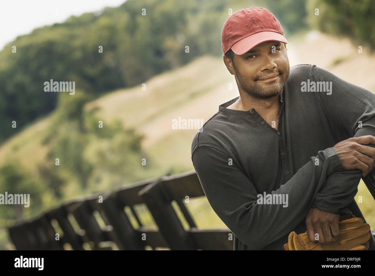 New York state USA young man with baseball cap standing on walkway ...