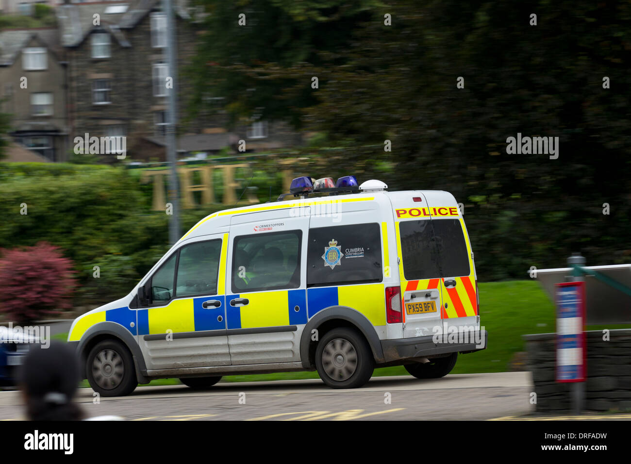 police van speeding to call out Stock Photo - Alamy