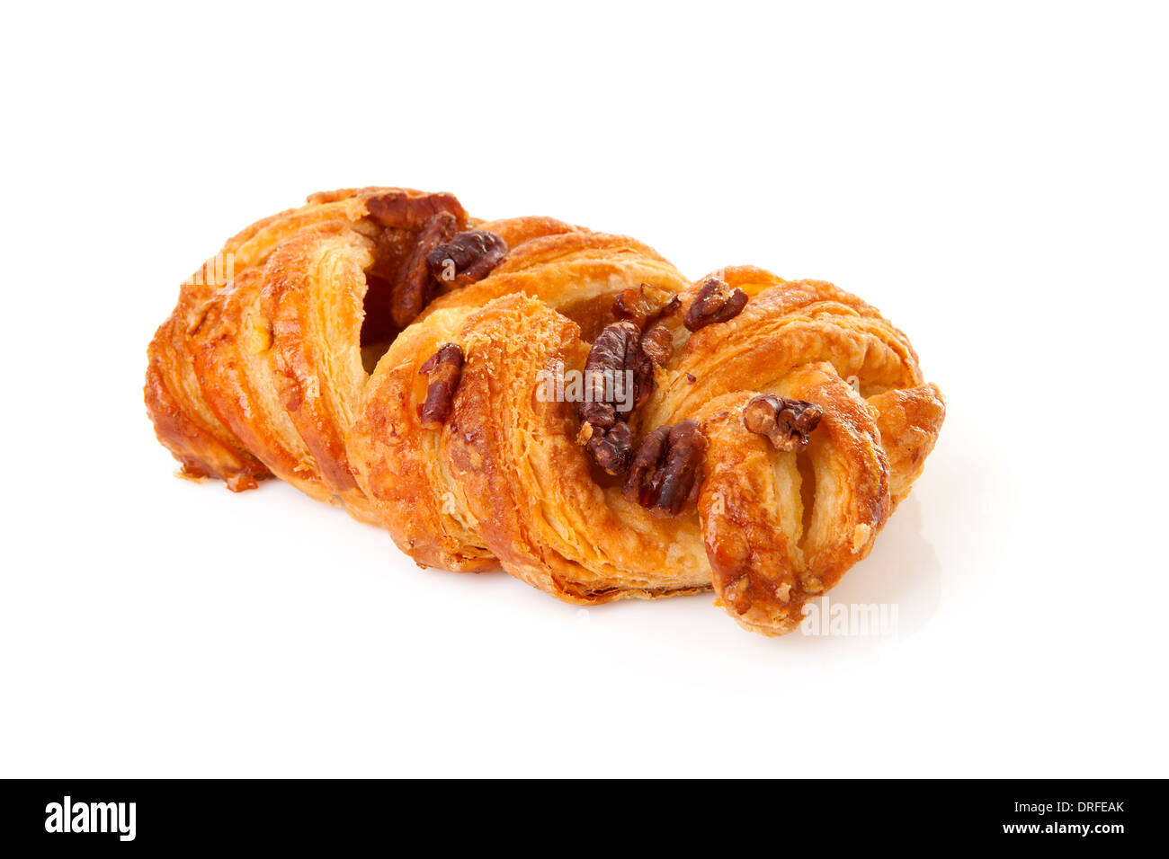 Fancy puff pastry with nuts over white background Stock Photo - Alamy