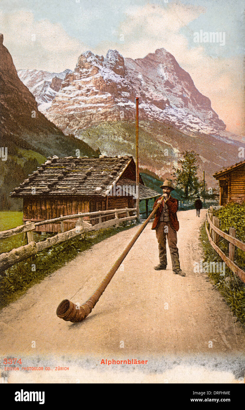 Blowing an Alpenhorn, Switzerland Stock Photo - Alamy