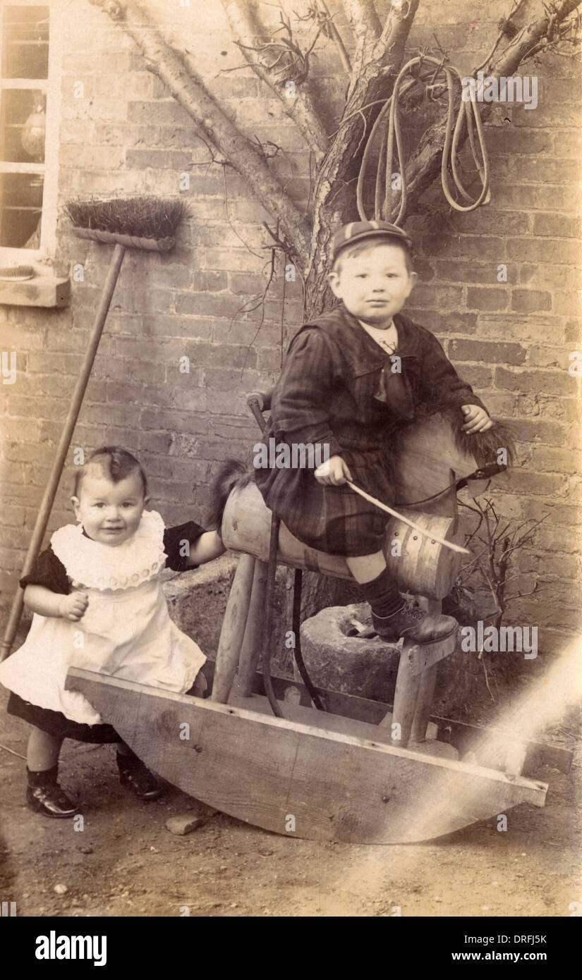 Little boy on a Rocking Horse Stock Photo - Alamy