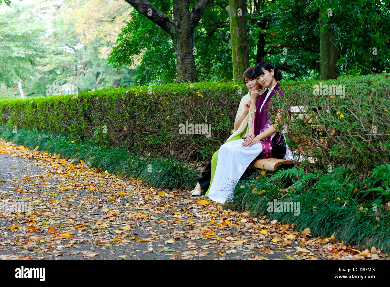 Two japanese women sitting hi-res stock photography and images - Alamy