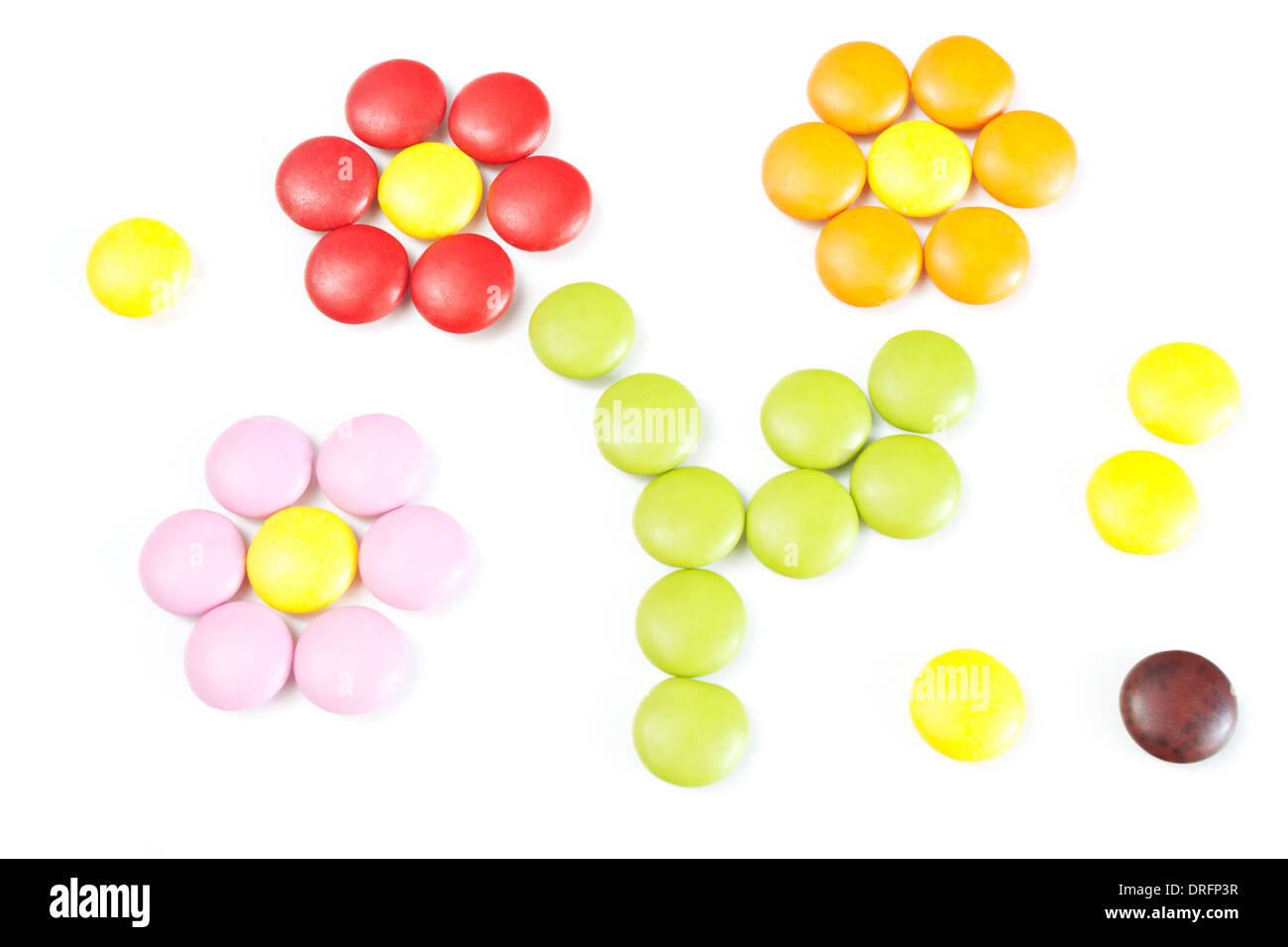 Candy flowers. Many colourful candy filling background Stock Photo - Alamy