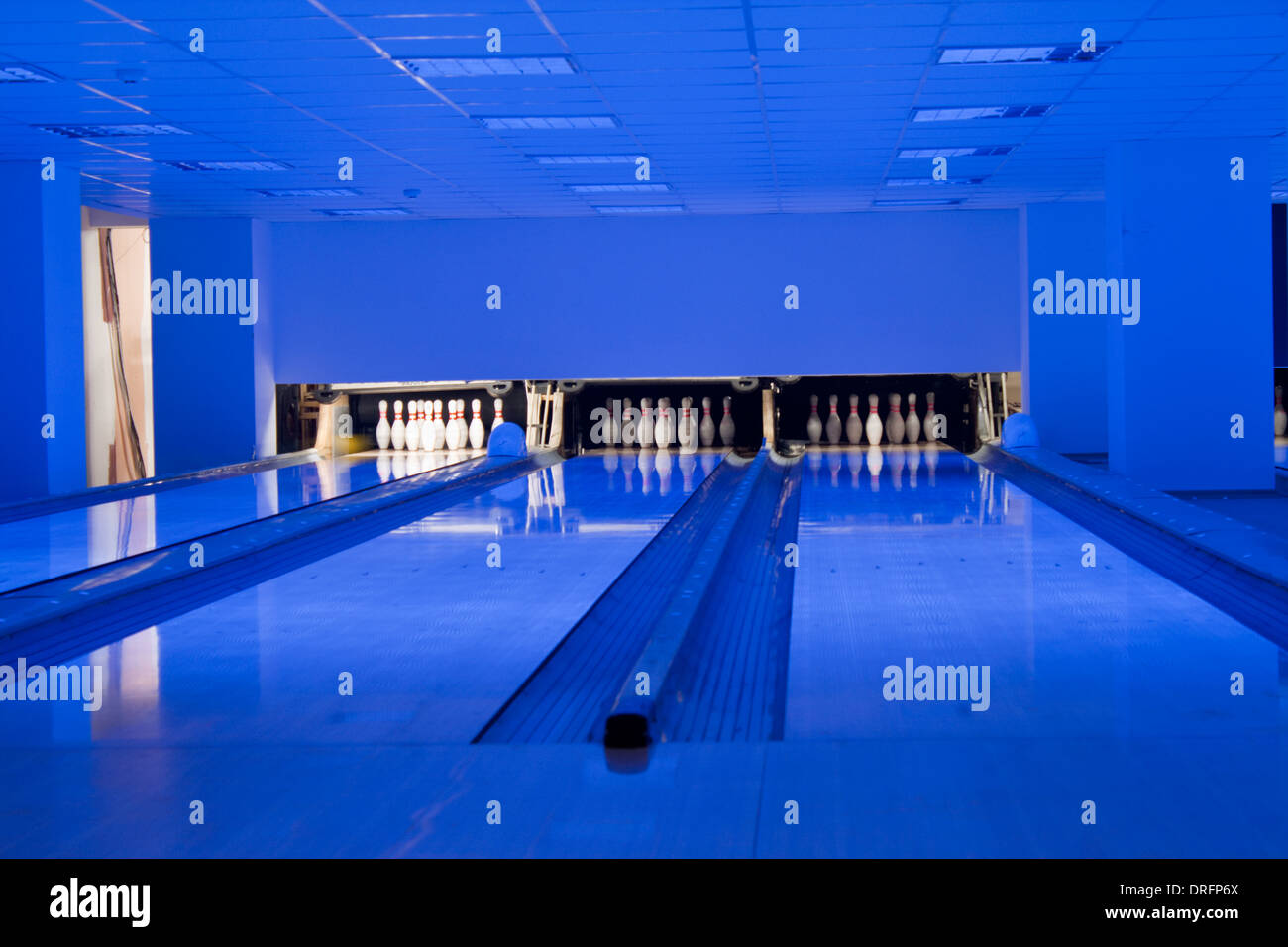 Bowling hall. Bowling bowls in row. Bowling lanes Stock Photo - Alamy