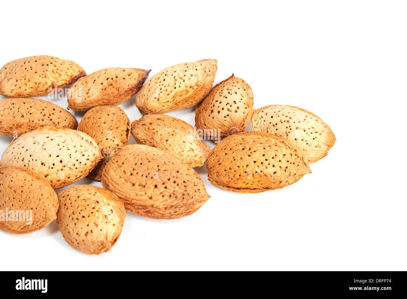 Almond kernel isolated on white background Stock Photo - Alamy